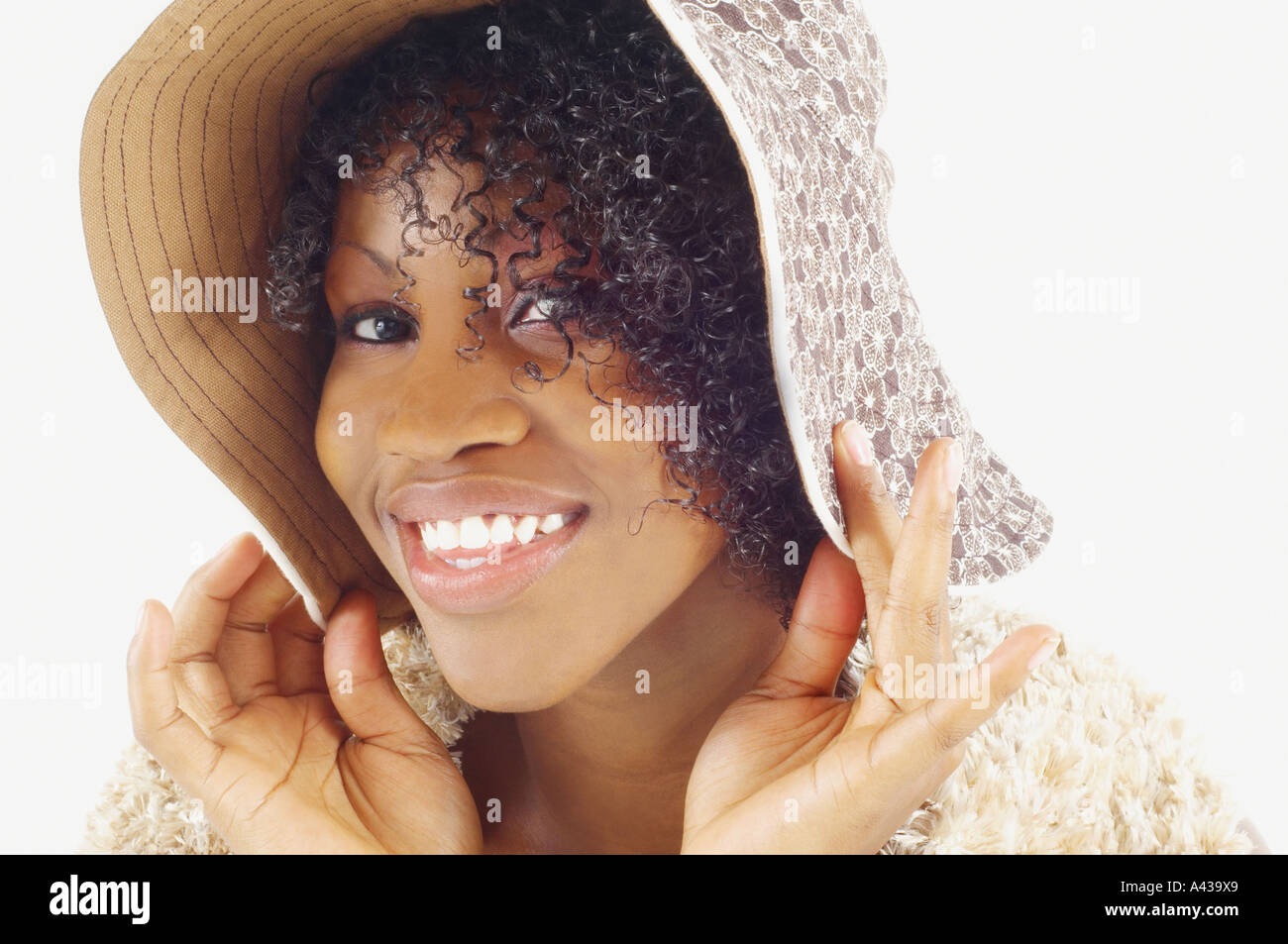 Pulling hat down hi-res stock photography and images - Alamy