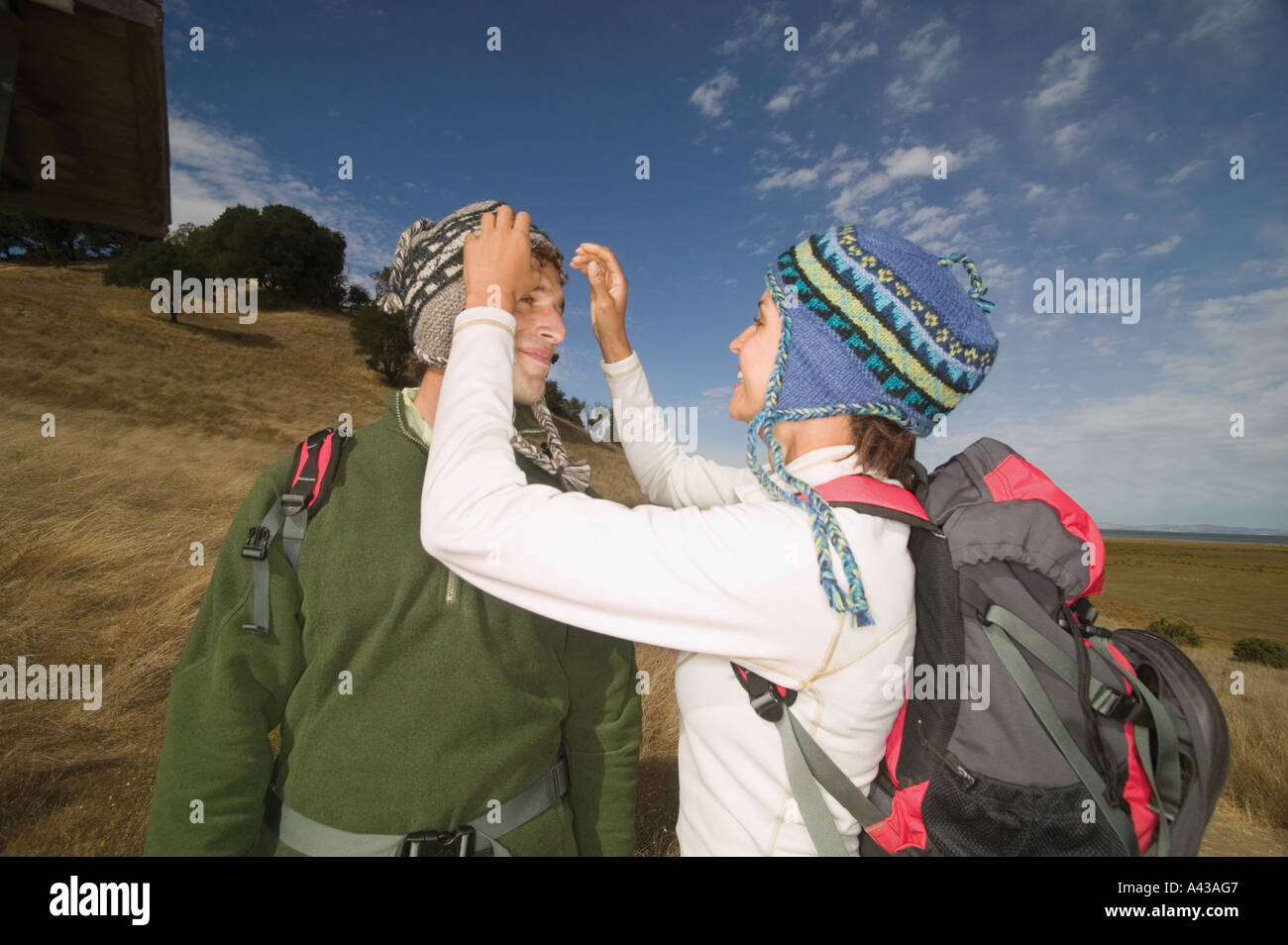 Couple wearing backpacks in hi-res stock photography and images - Alamy