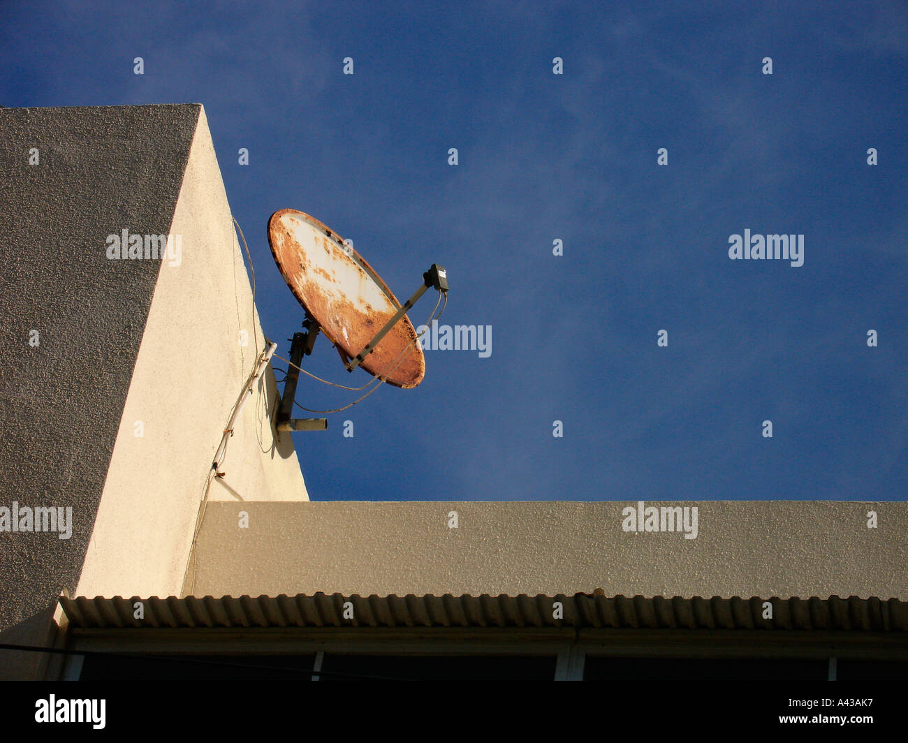 Rusted satellite on a residential building Stock Photo - Alamy