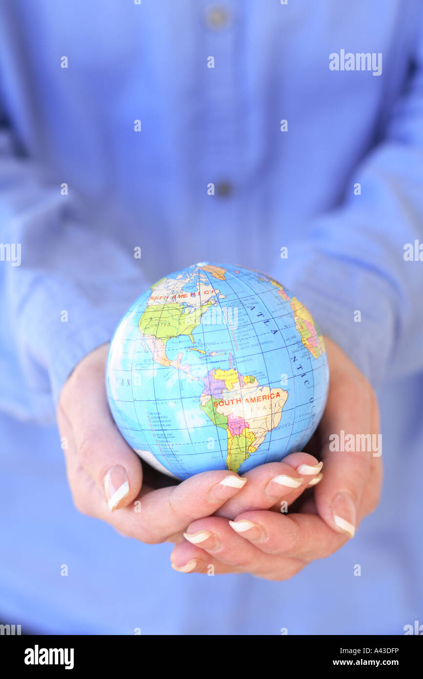 Hands holding globe Stock Photo - Alamy