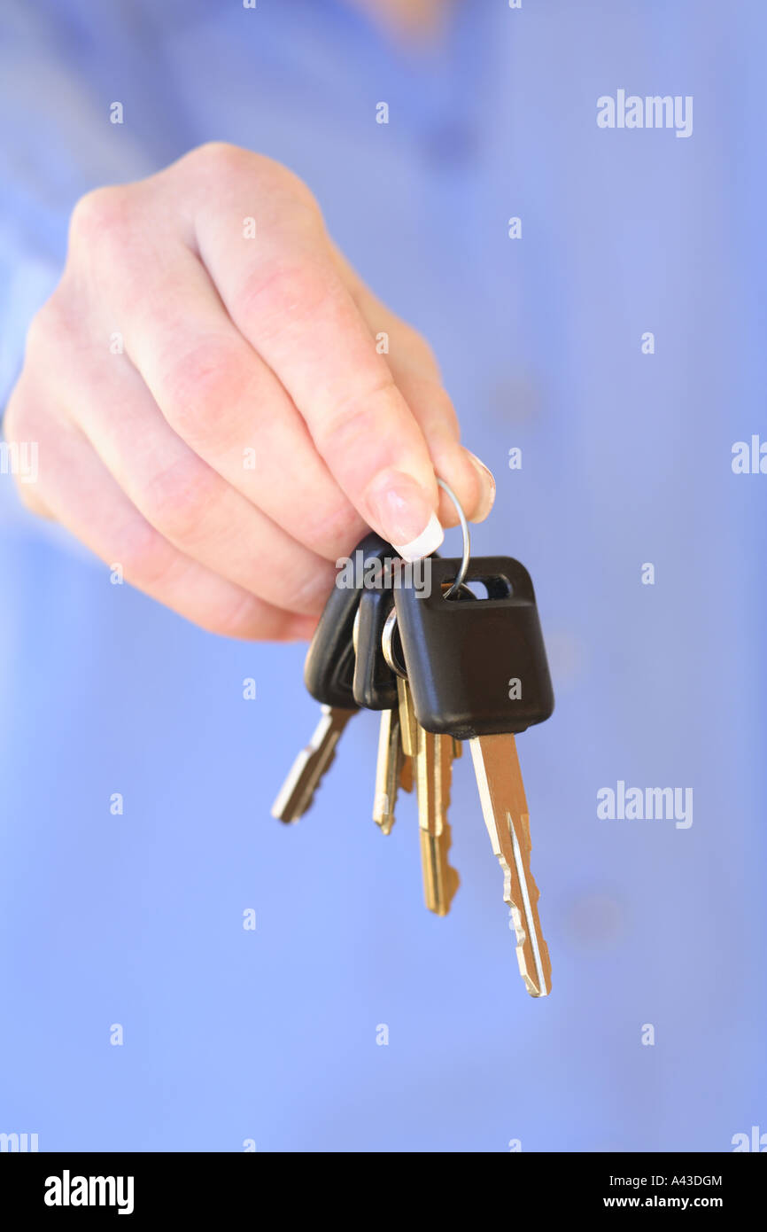 Hand Holding Keys Stock Photo - Alamy