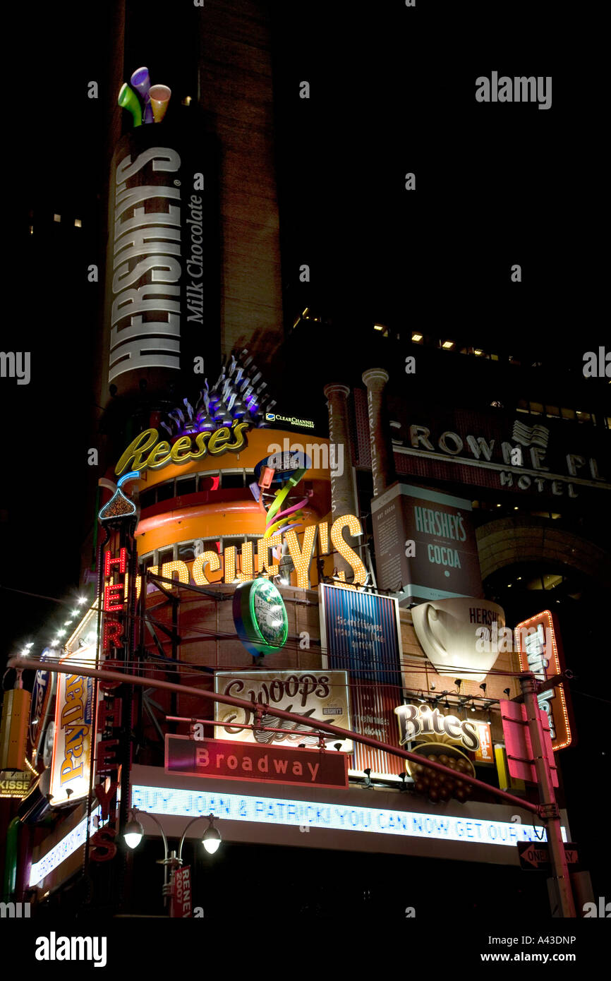 neon signs at night on broadway manhattan Stock Photo - Alamy