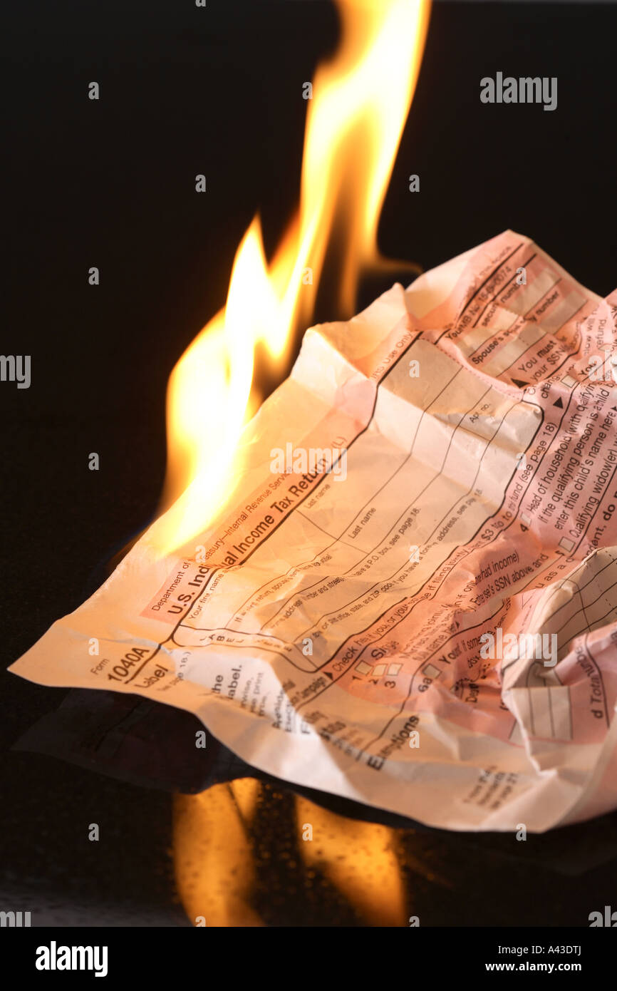 Tax form burn hi-res stock photography and images - Alamy