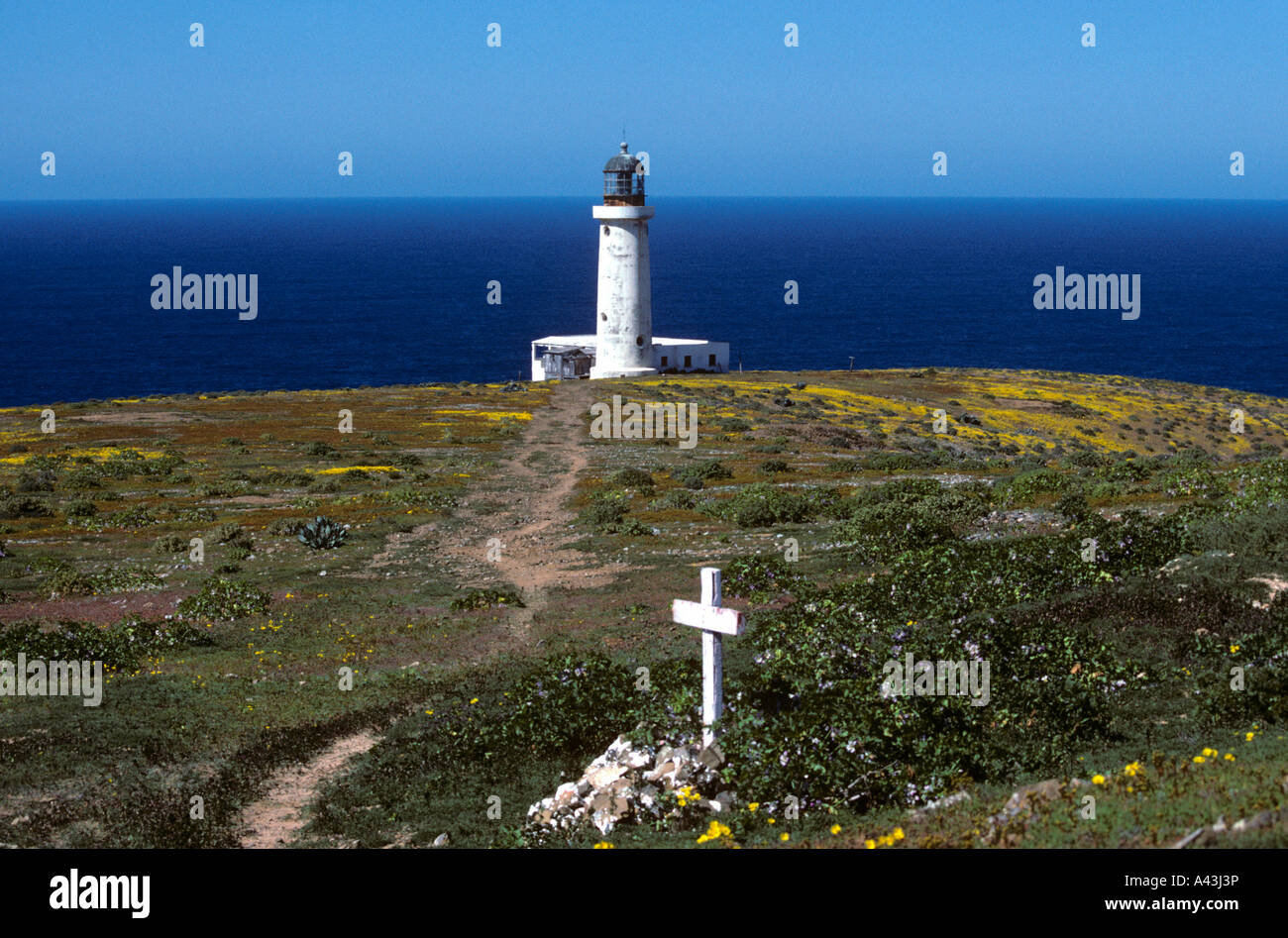 Grave marker and lighthouse. San Benito Island. Baja California, Mexico ...