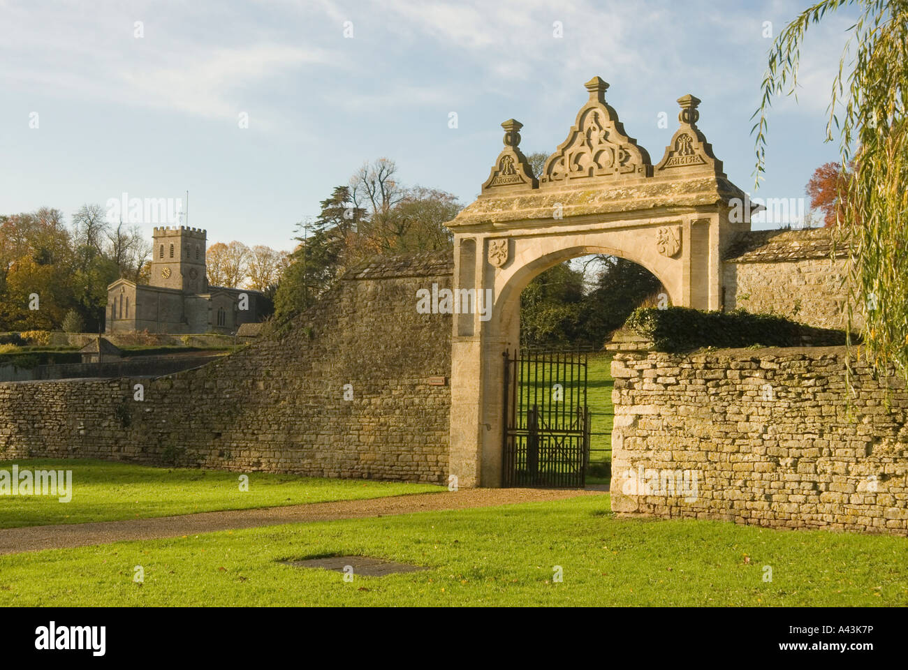 Gabled stone gateway dated 1615 and church, Tackley, Oxfordshire ...