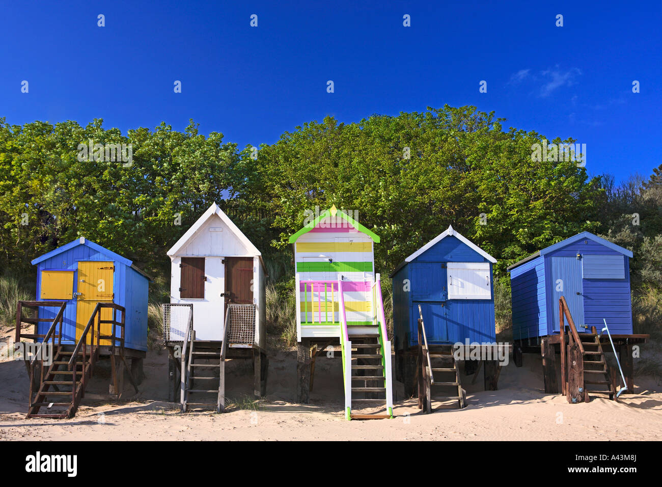 Beautiful colourful beach huts hi-res stock photography and images - Alamy