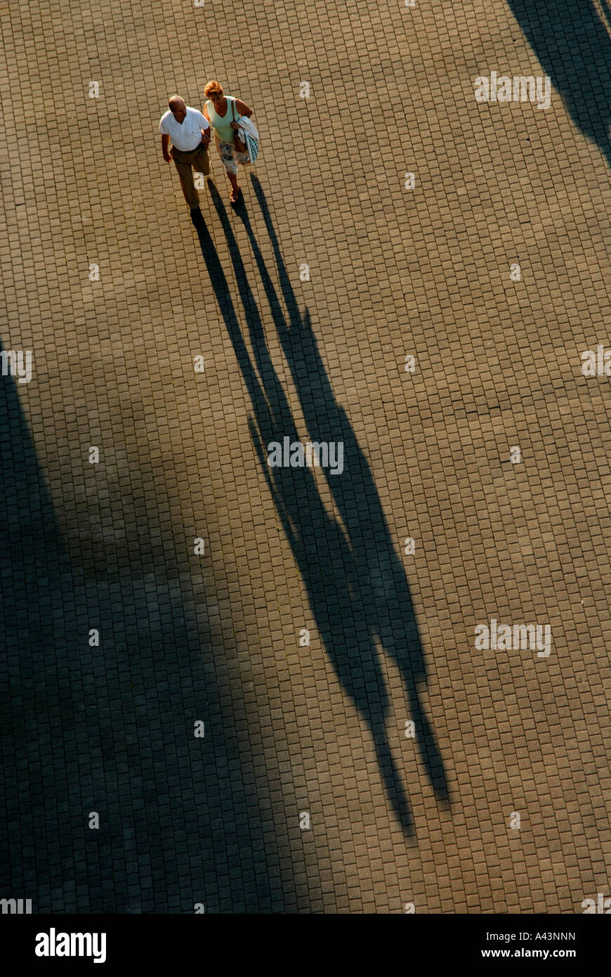 PEDESTRIAN WALKING SILHOUETTES SHADOW Stock Photo - Alamy