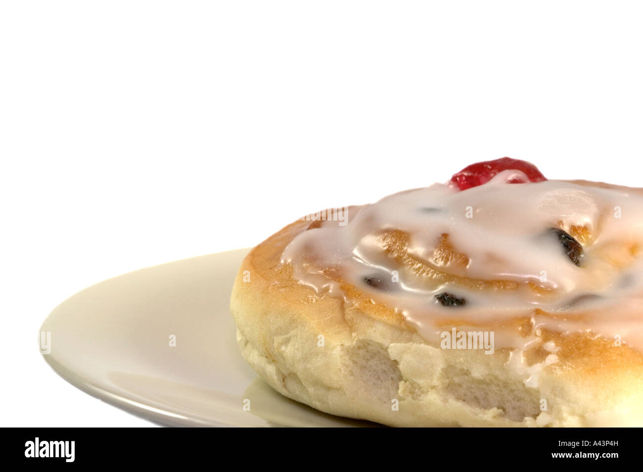 Belgian bun isolated on white and framed in the lower right to allow ...
