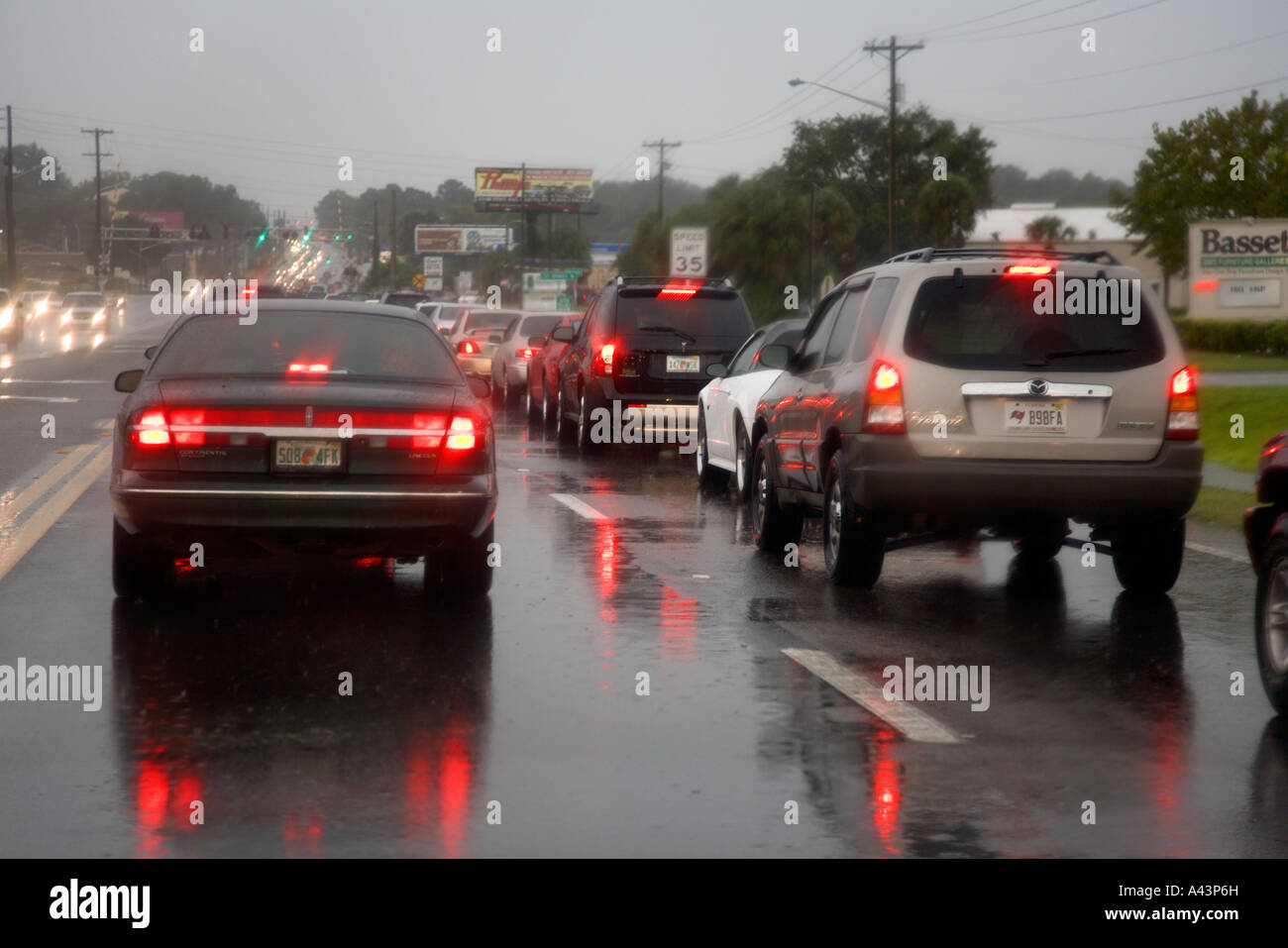 Heavy traffic in rain Stock Photo - Alamy
