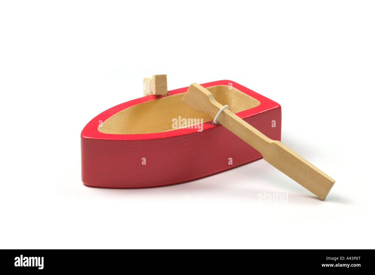 Red toy row boat isolated on white Stock Photo - Alamy