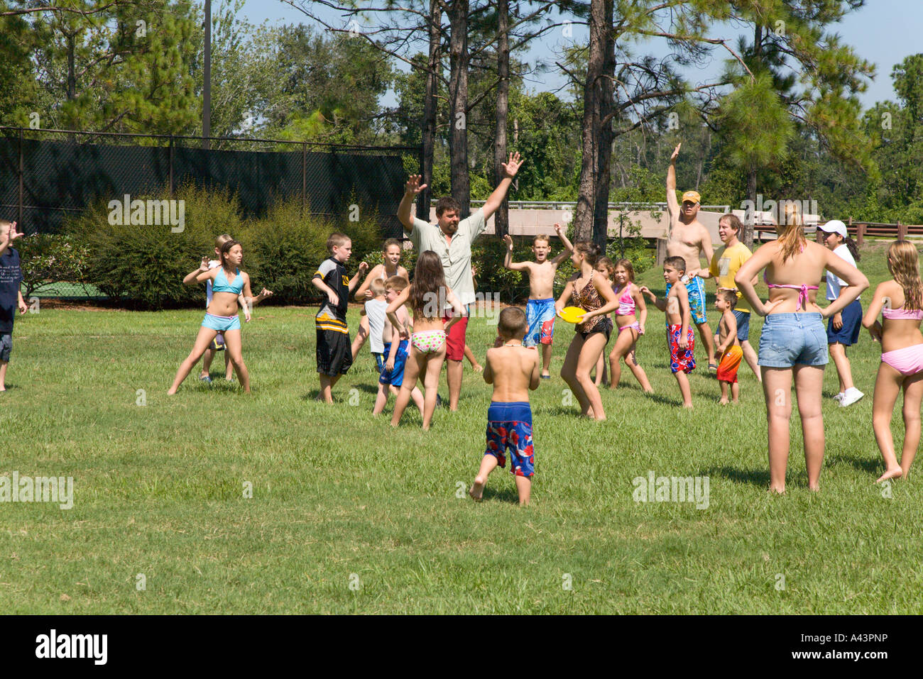 Guests play ultimate Frisbee organized activity at Fort Wilderness in ...