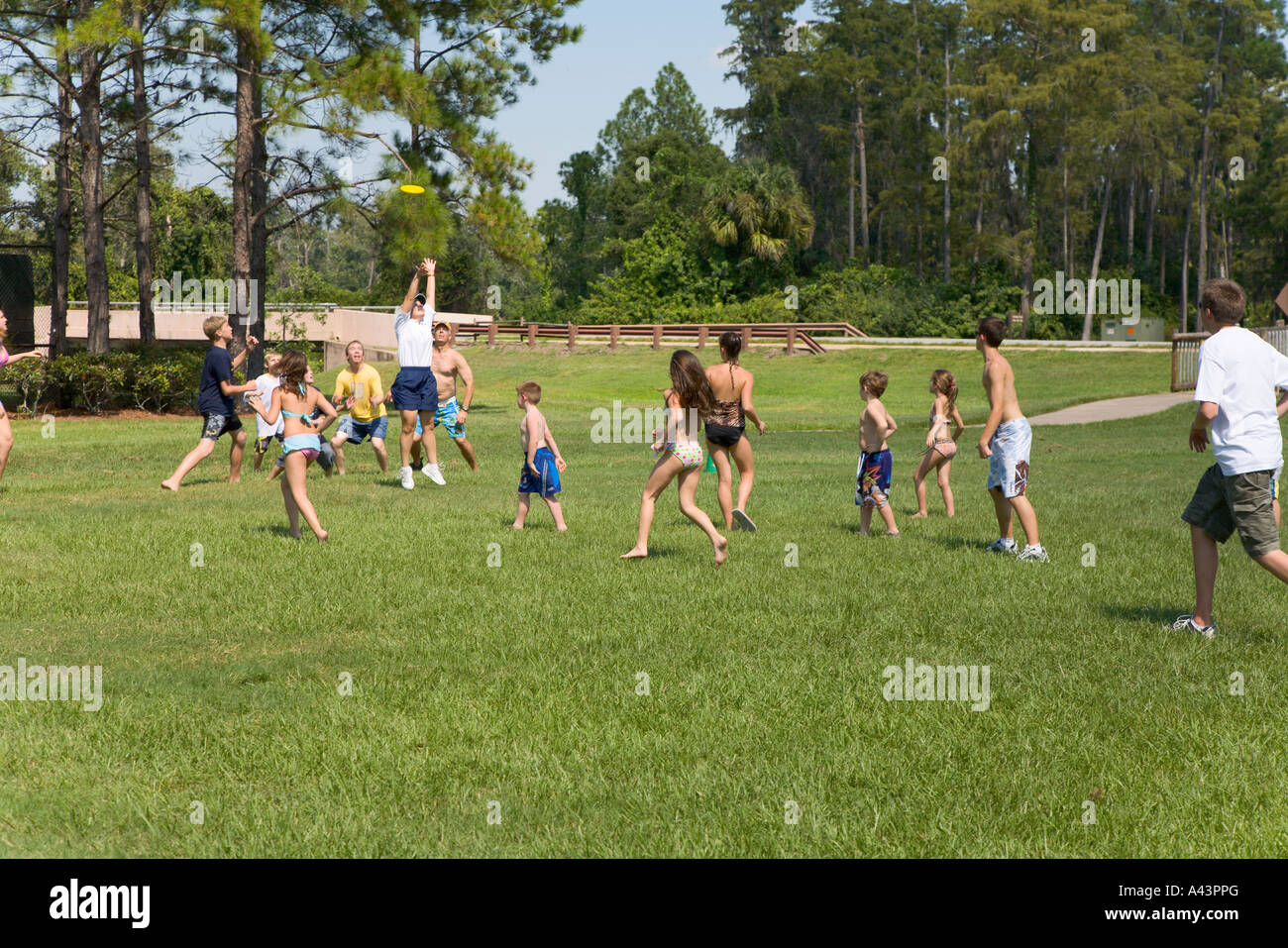 Guests play ultimate Frisbee organized activity at Fort Wilderness in ...