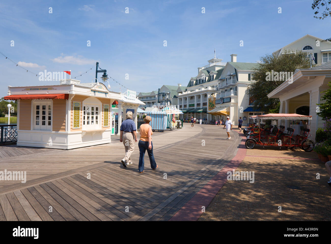Couple walks along Boardwalk in Walt Disney World, Florida, USA Stock ...