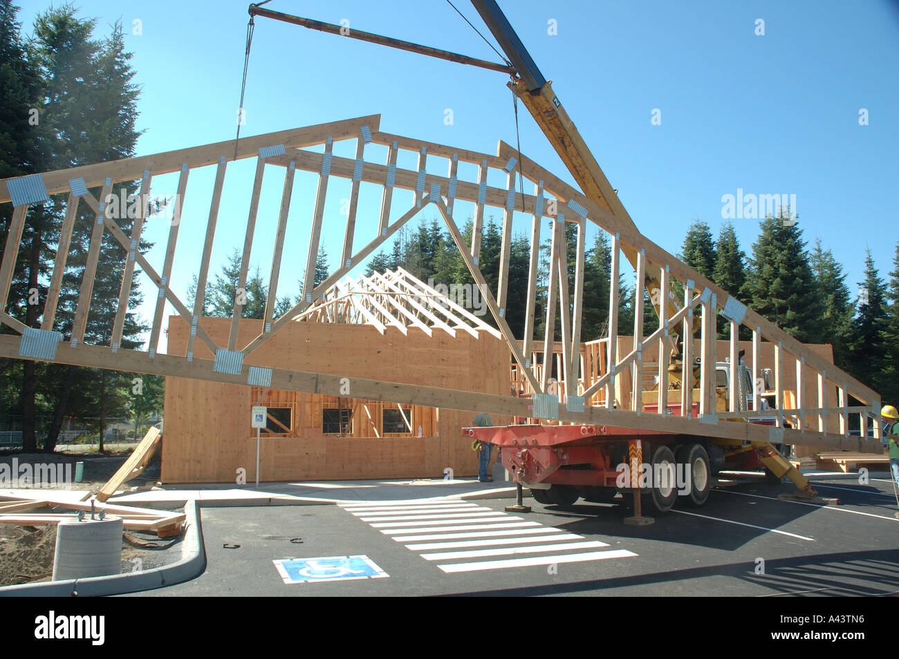 Construction - Lifting A Wooden Roof Truss With A Crane At Construction ...
