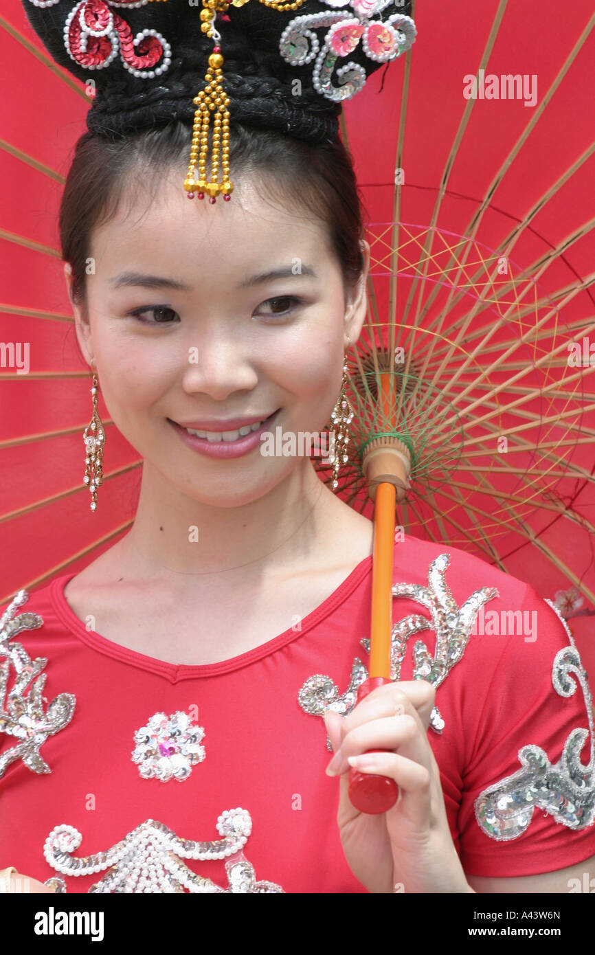 Chinese Folk Dancer with Umbrella Stock Photo - Alamy