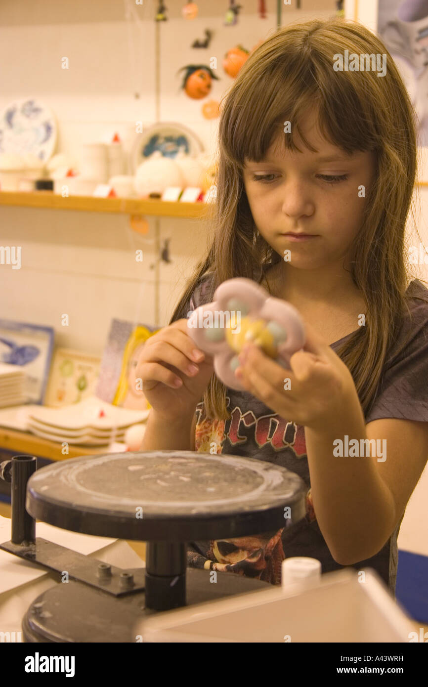 Child pottery painting hi-res stock photography and images - Alamy
