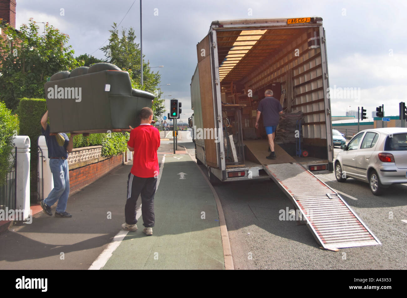Packing the removal van Stock Photo - Alamy