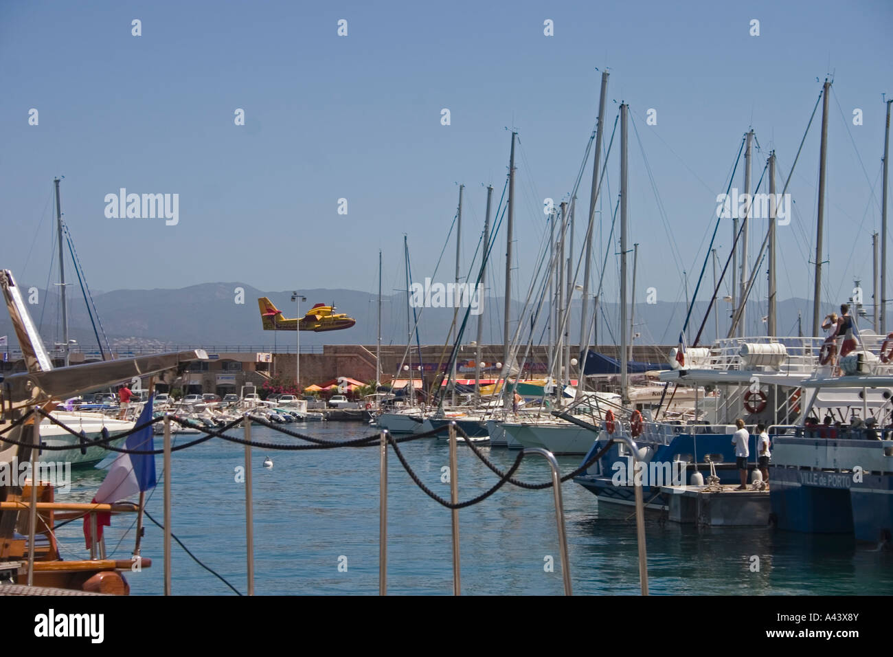 Seaplane over harbour Stock Photo - Alamy