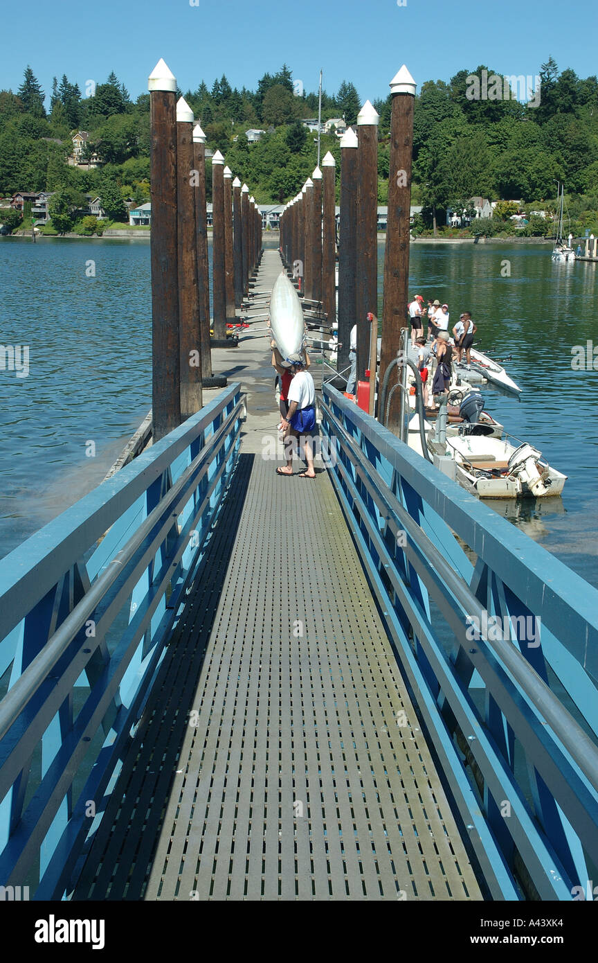 Rowing Crew and Boats on dock Stock Photo - Alamy