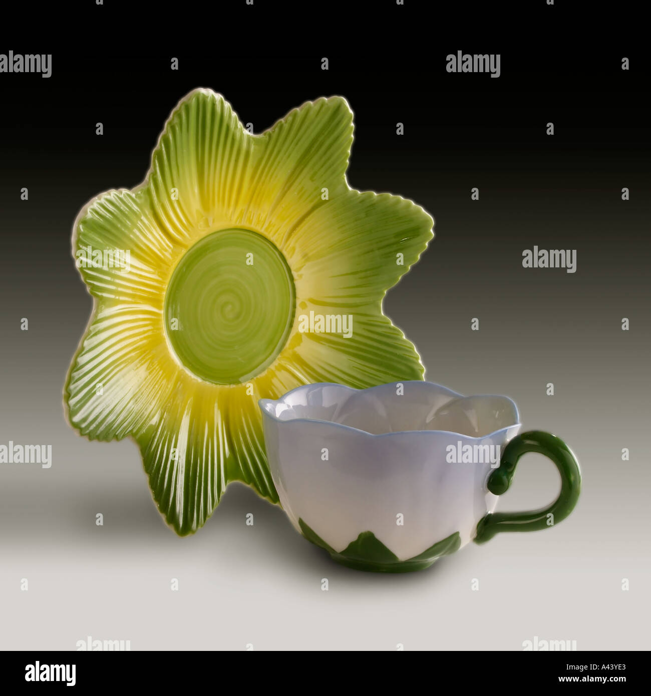Teacup and saucer flower shape Stock Photo - Alamy
