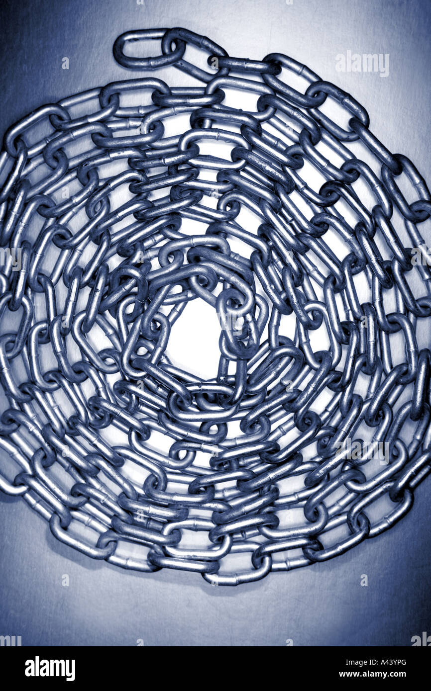 Metal chain coiled Stock Photo - Alamy