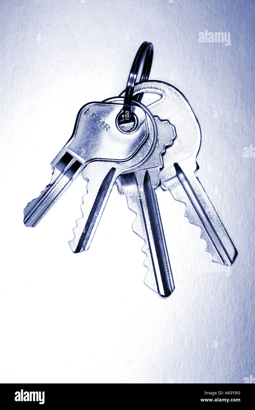 Four keys on keyring Stock Photo - Alamy