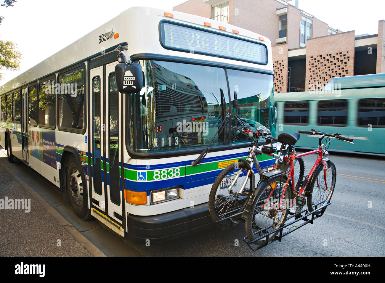 TEXAS Austin Bicycles on rack on front of city bus public ...