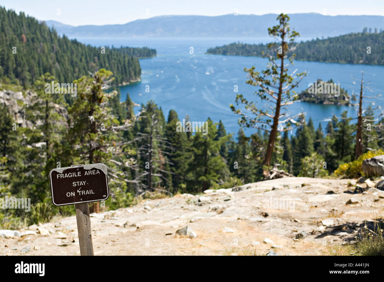 CALIFORNIA Lake Tahoe Fragile Area Stay on Trail sign at overlook of ...