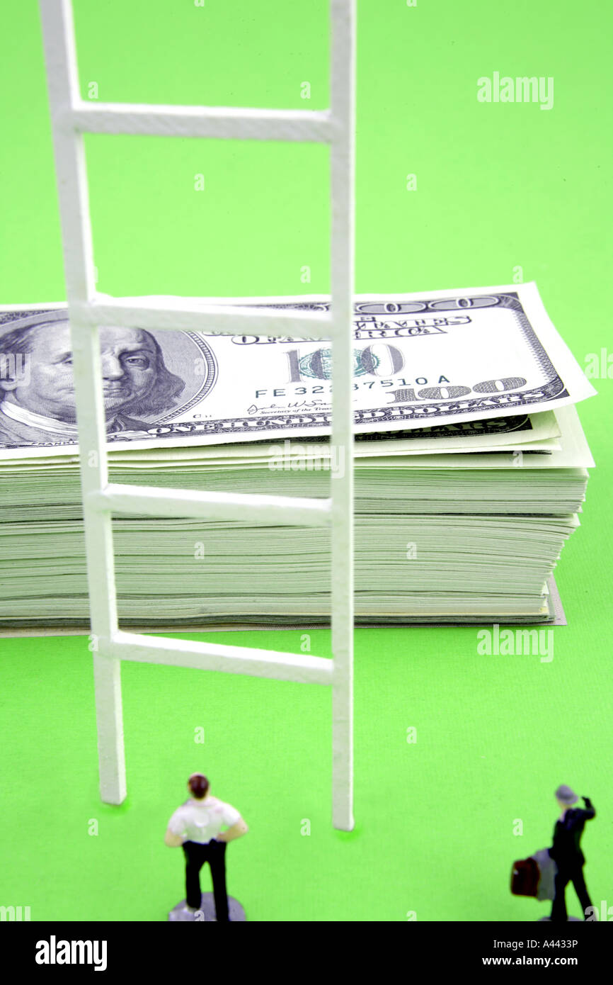 Figures, ladder and pile of American currency Stock Photo - Alamy