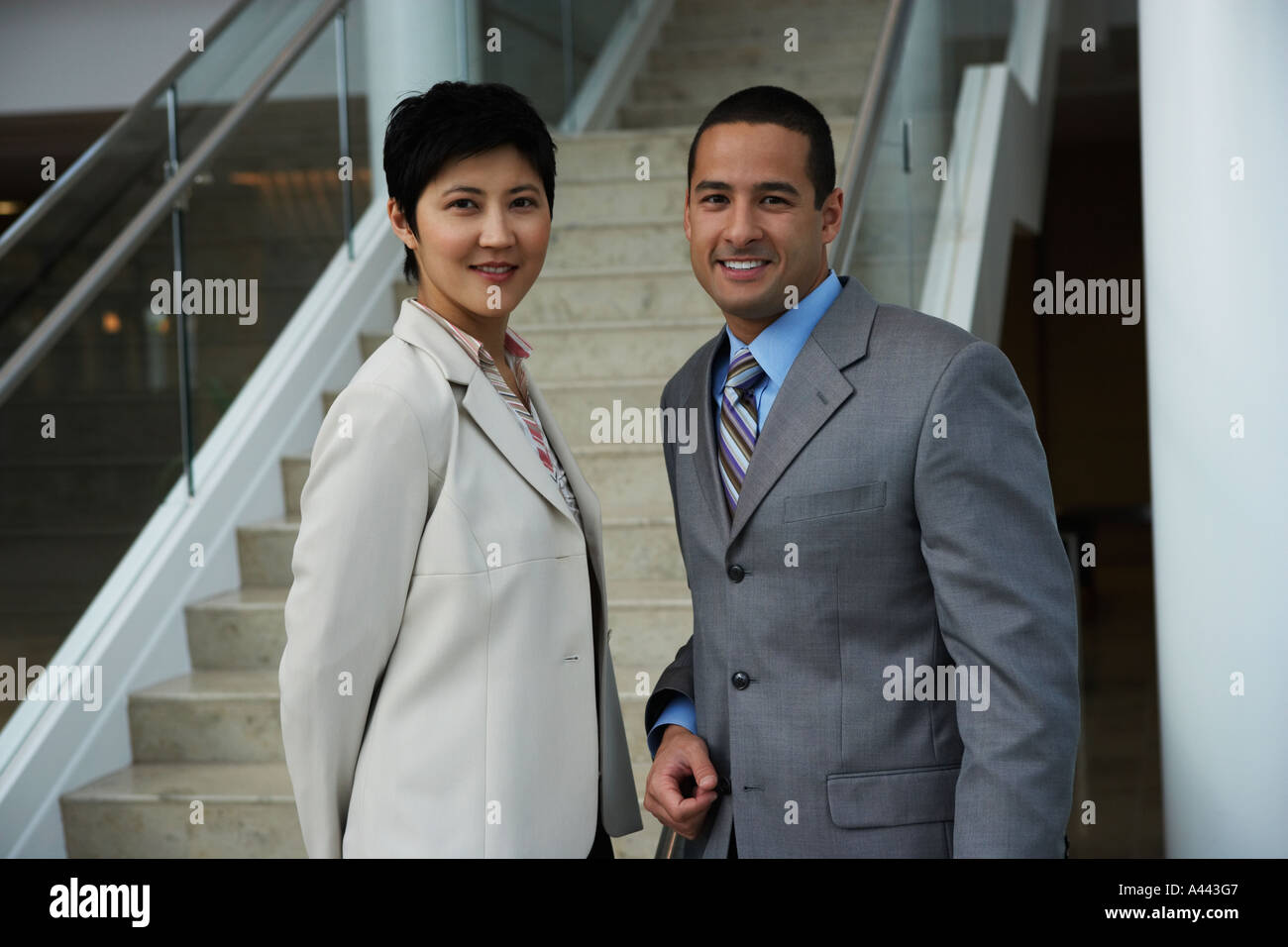 Portrait of two business people Stock Photo - Alamy