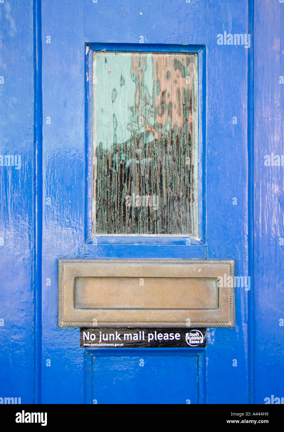 A blue front door with no junk mail please sticker by letter box Stock ...