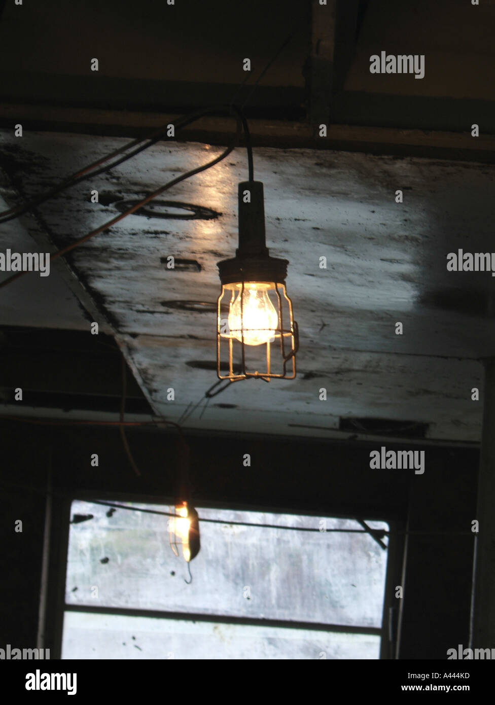 security light in old shed Stock Photo - Alamy