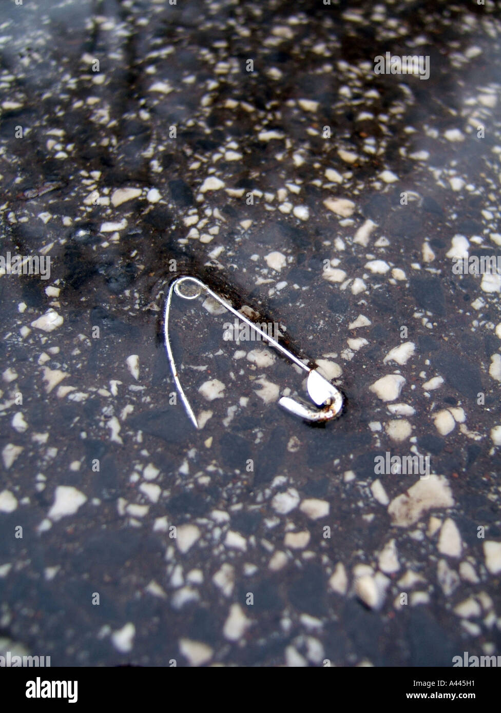 safety pin in pool of water Stock Photo - Alamy
