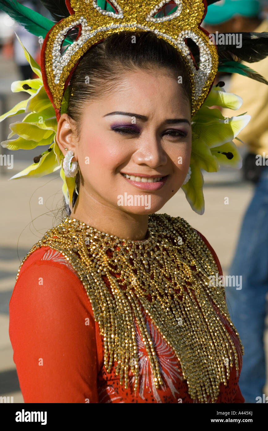 Beautiful girl in traditional costume at the Floral Parade on January ...