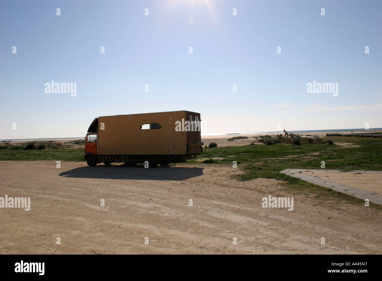 lone camper van on beach Stock Photo - Alamy