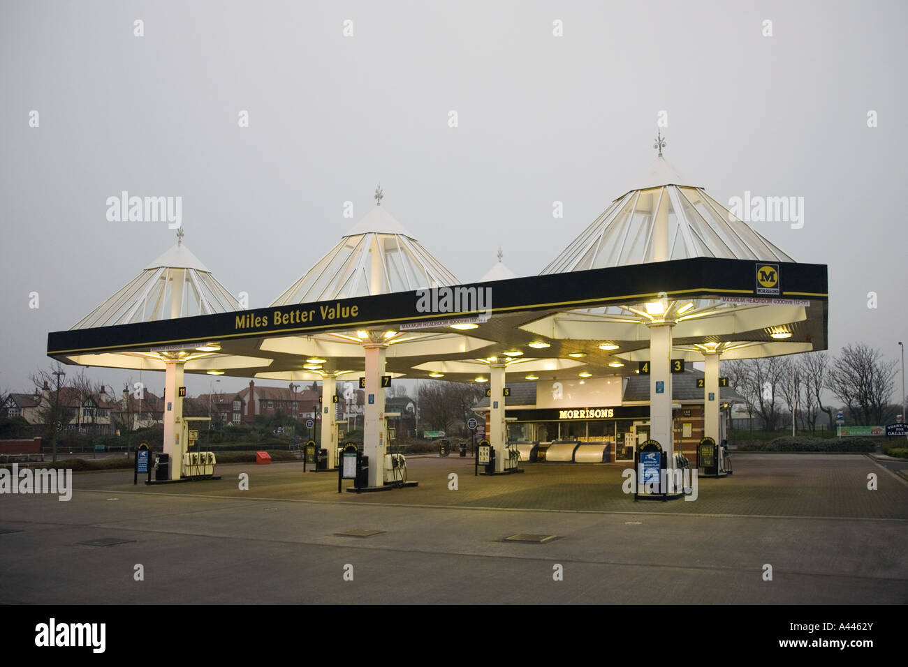 Supermarket Petrol Pump dusk lights empty canopy pyramid domed white ...