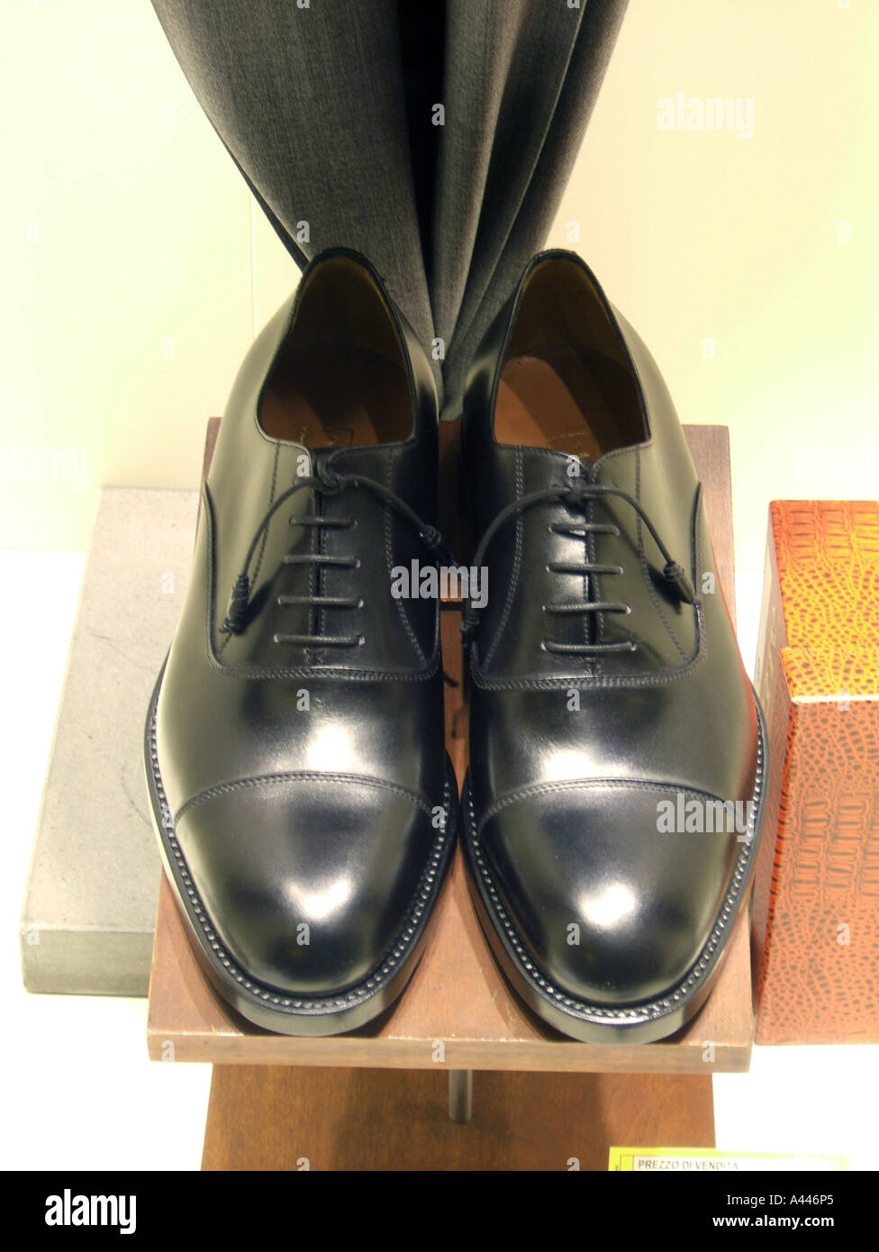 pair of men's black shoes in shop window Stock Photo - Alamy