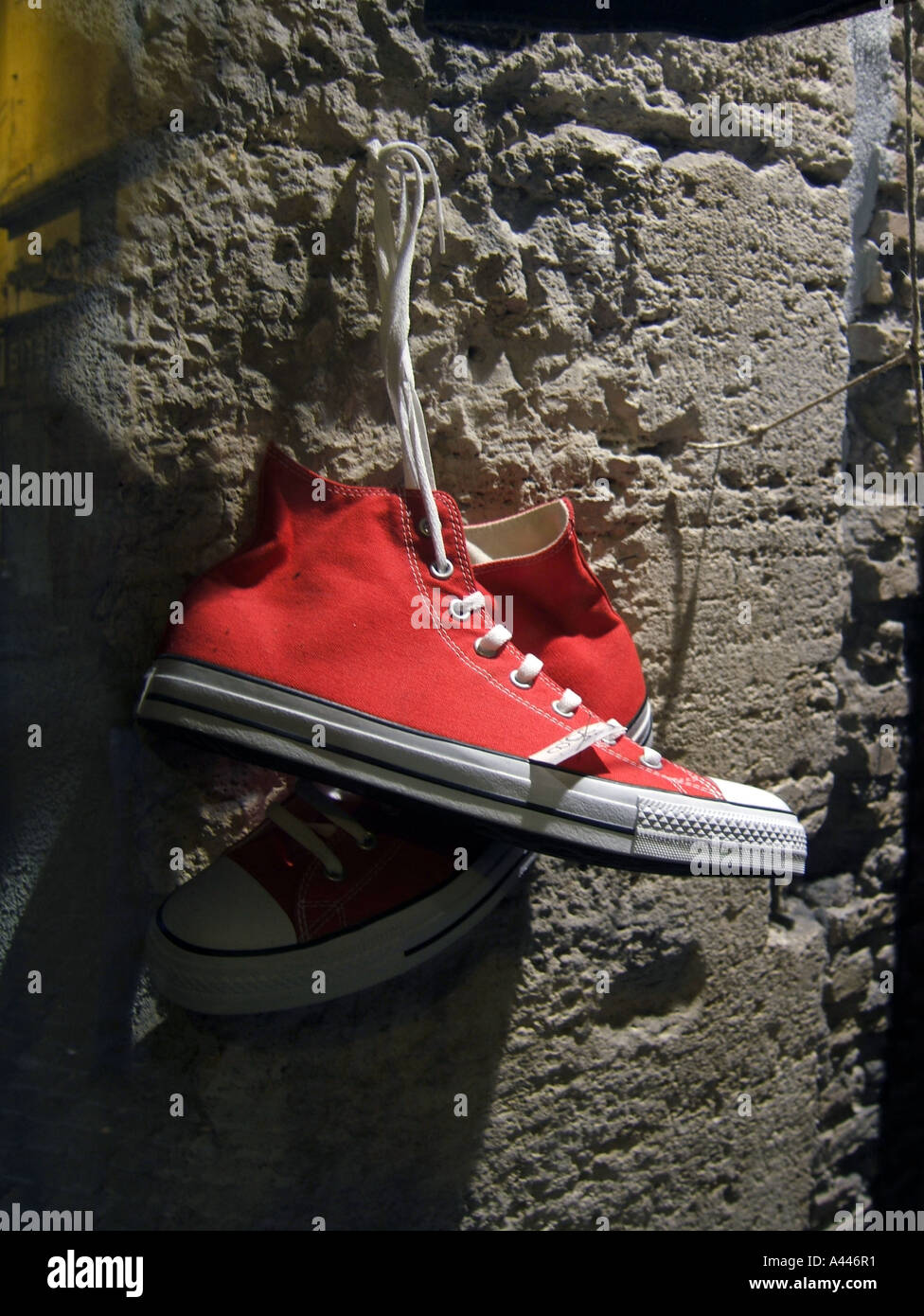 red trainers in shop window Stock Photo - Alamy