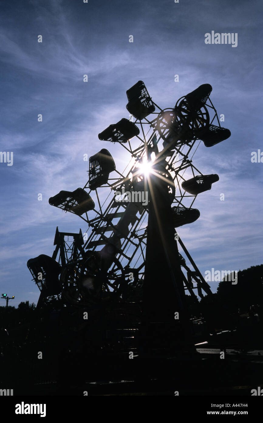 Zipper Carnival ride with sun also known as a Tilt a wheel Stock Photo ...
