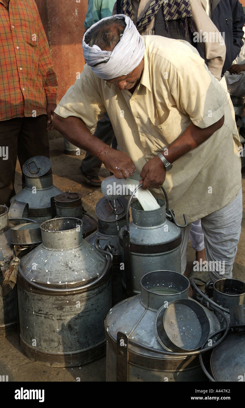 Indian man selling milk on hi-res stock photography and images - Alamy