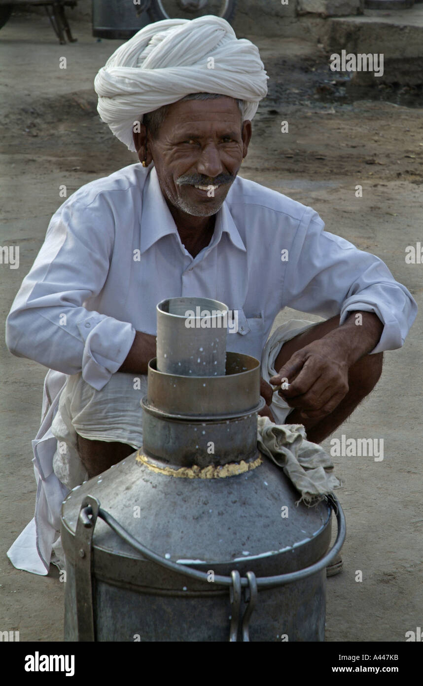 Man selling milk at the milk market in Jaipur, India Stock Photo - Alamy