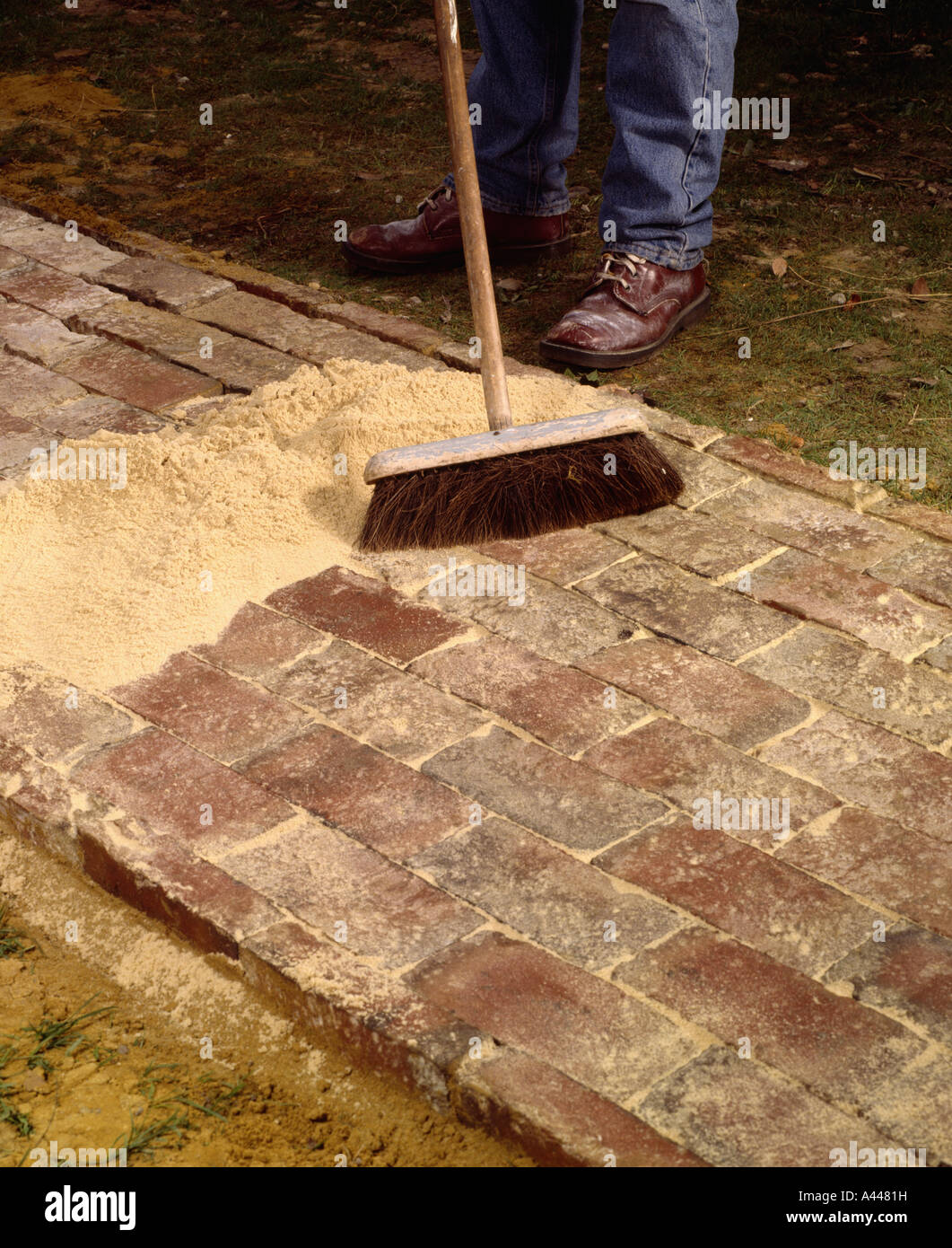 Sweeping up sand hi-res stock photography and images - Alamy
