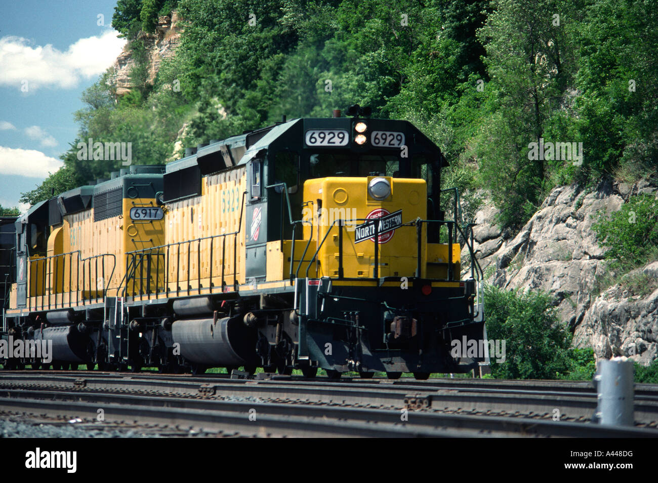 Chicago and Northwestern CNW engine number 6929 leading a train into Pig s Eye Yard in St Paul ...