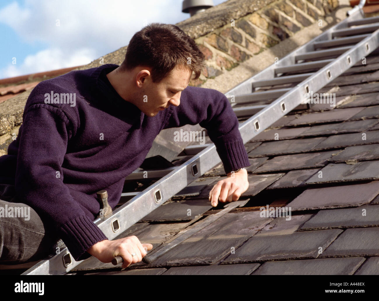 Ladders on roof hi-res stock photography and images - Alamy