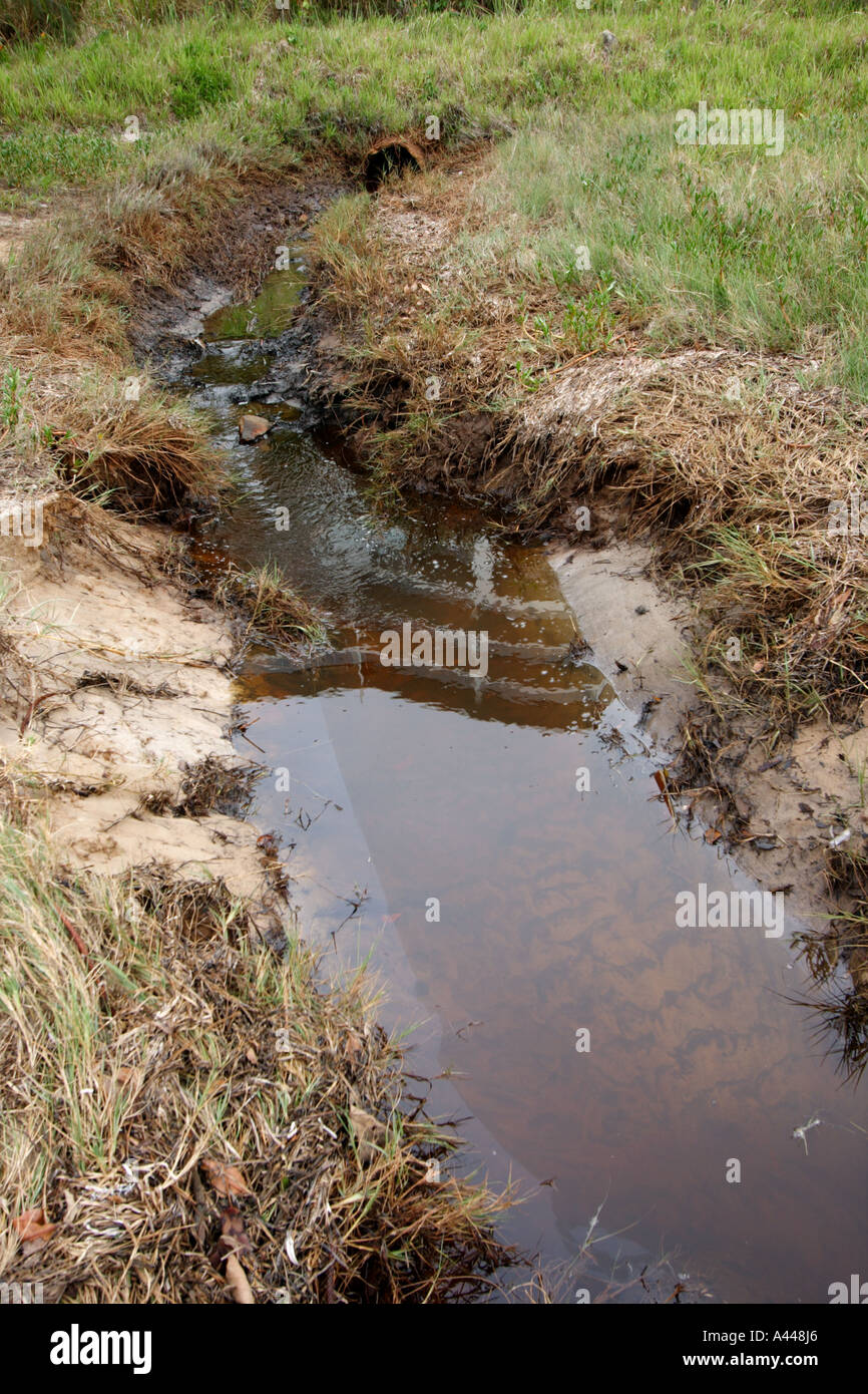 OVERFLOW DRAIN LEADING TO A LAKE Stock Photo - Alamy