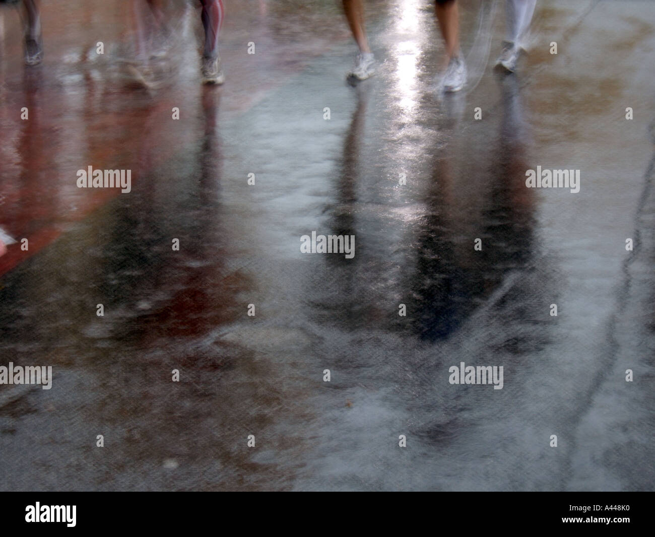 runners feet in rain Stock Photo - Alamy