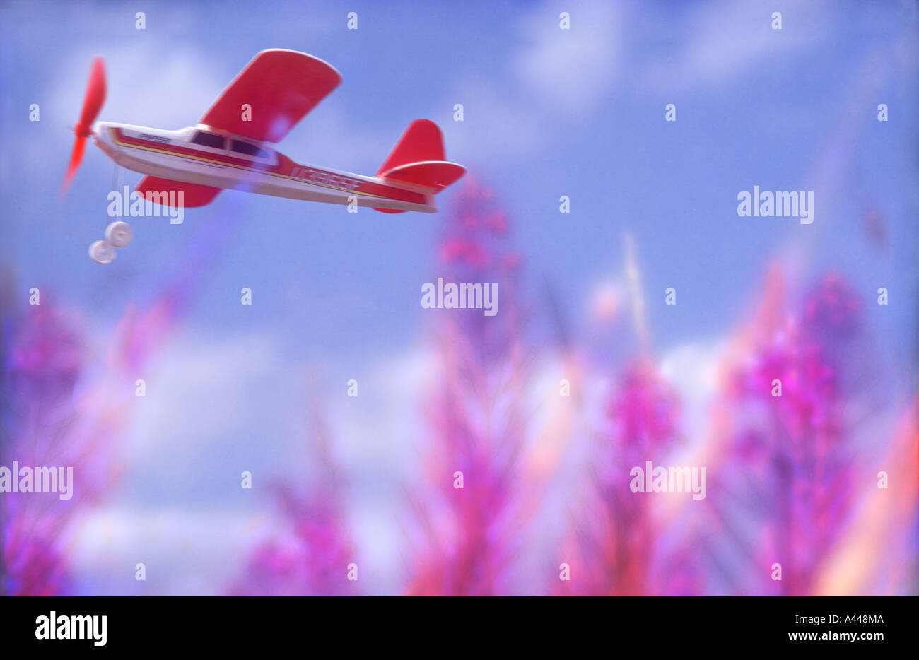 Toy aeroplane flying hi-res stock photography and images - Alamy