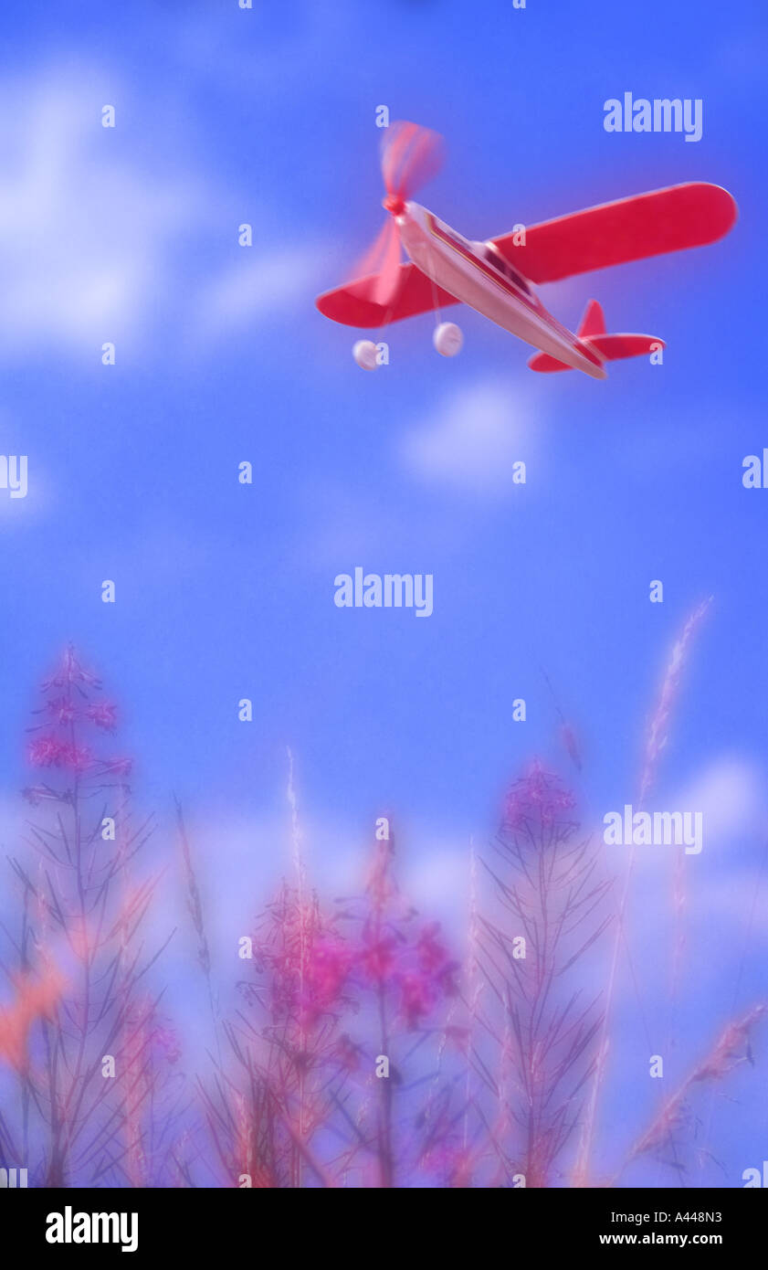 Toy aeroplane flying hi-res stock photography and images - Alamy