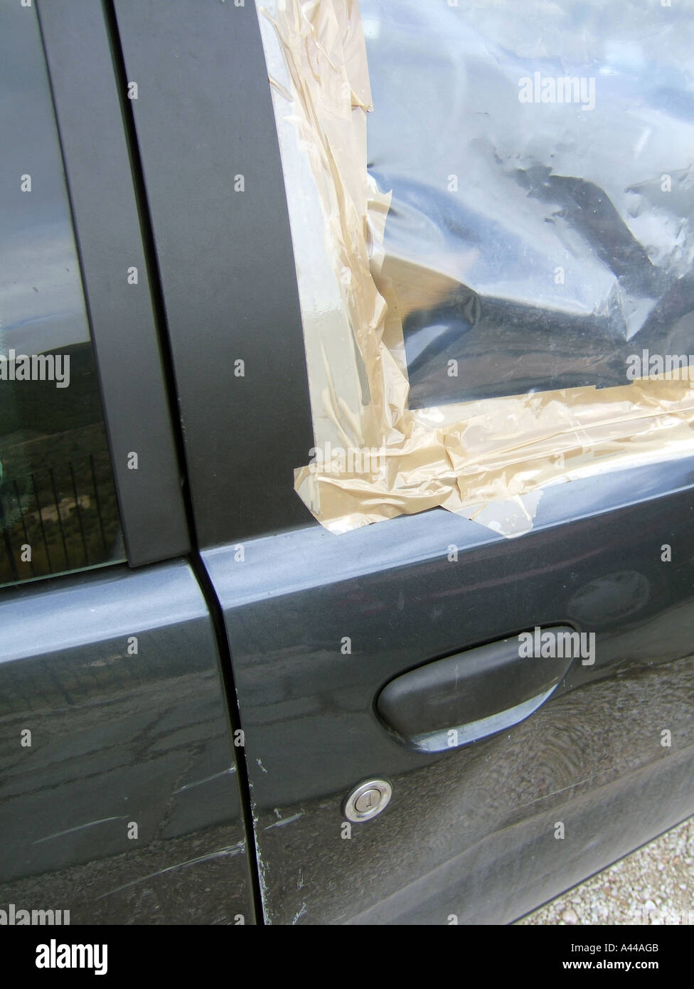 temporary repair for smashed car window Stock Photo - Alamy