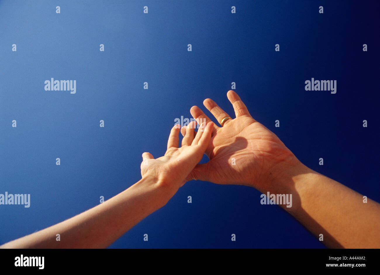 Hand Raised Skyward High Resolution Stock Photography and Images - Alamy